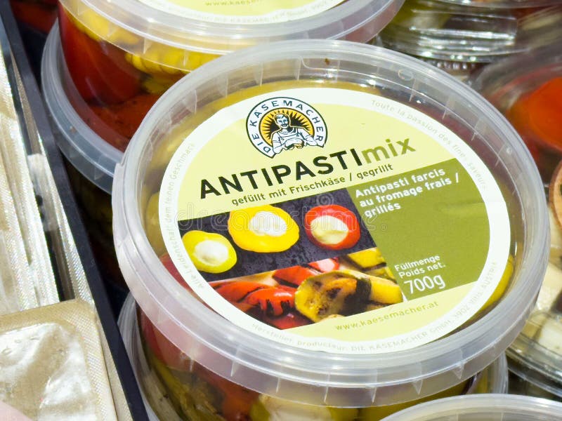 Antipasti Mix with Fresh Cheese in Plastic Container Editorial Stock ...
