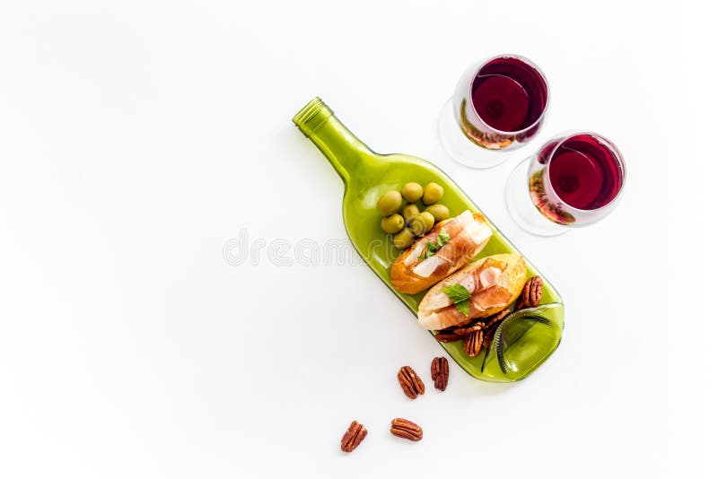 Antipasto on Glass Bottle Plate and Red Wine in Glasses Top-down Copy ...