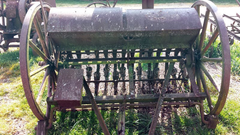 Antique seeder on a lawn. stock image. Image of retro - 2714457