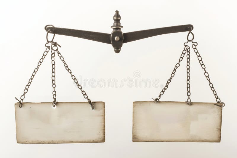 Antique Balance Scale with Empty Tags on Display Against a Neutral ...