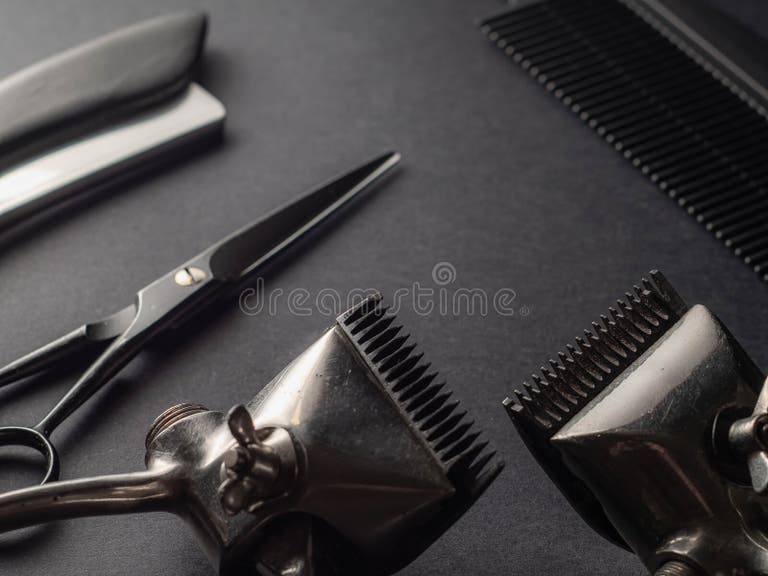 Antique Barber Tools are Artfully Placed on a Dark Surface ...
