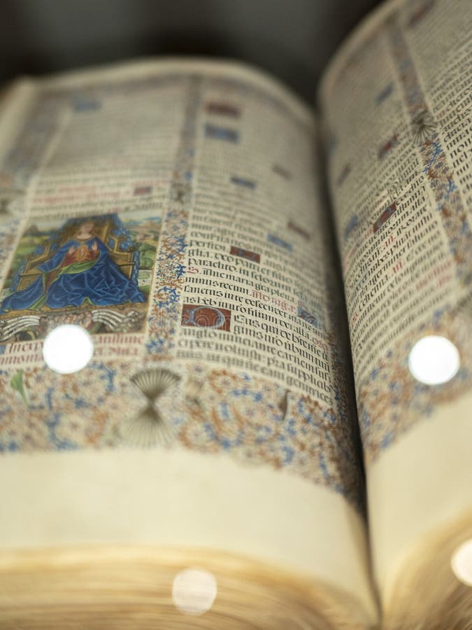 Antique Book with Yellowed and Worn Pages Resting on a Wooden Surface ...