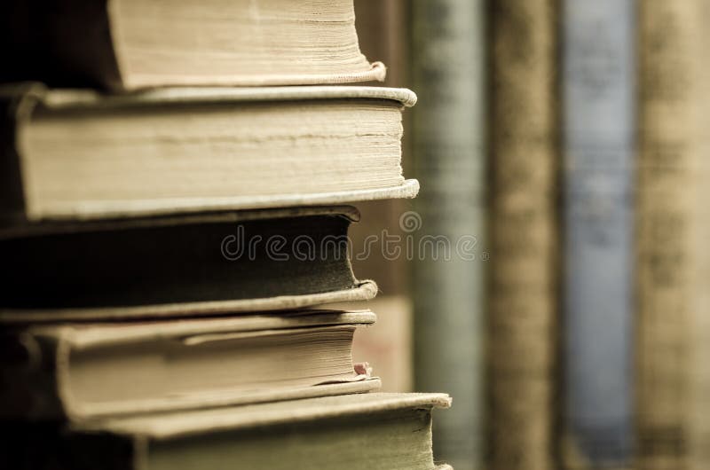 Antique books piled high stock image. Image of literature - 72570527
