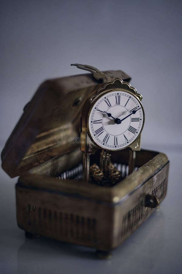 Antique Brass Box with Old Pendulum Table Clock Stock Image - Image of ...
