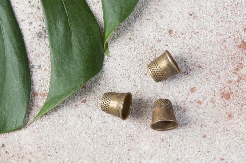 Antique brass thimbles stock photo. Image of notions - 164678614