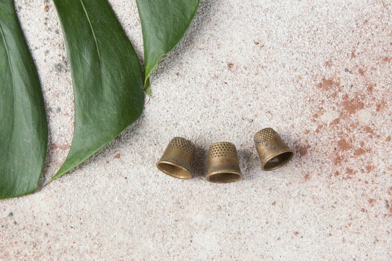 Antique brass thimbles stock image. Image of background - 164678651
