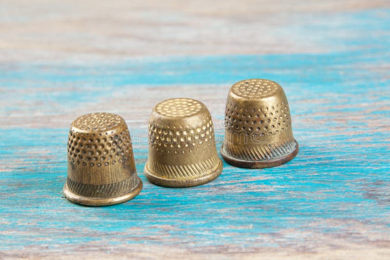 Antique brass thimbles stock photo. Image of antique - 223930502