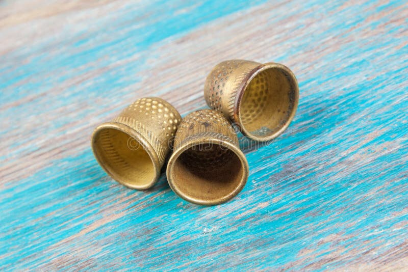 Antique brass thimbles stock photo. Image of three, tool - 223930544