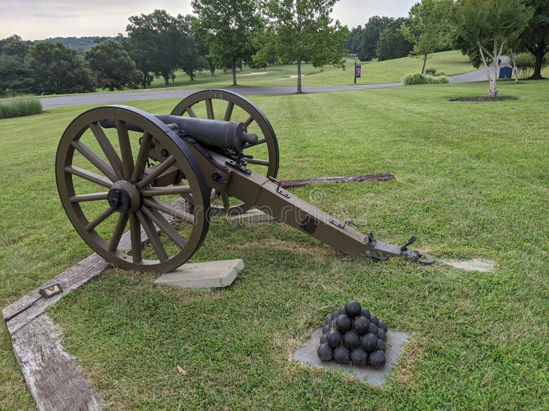 Antique Cannon with Cannon Balls Stock Image - Image of tree, farm ...