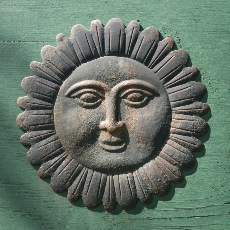 Antique Cast Iron Sun Face stock image. Image of symbol - 101403635