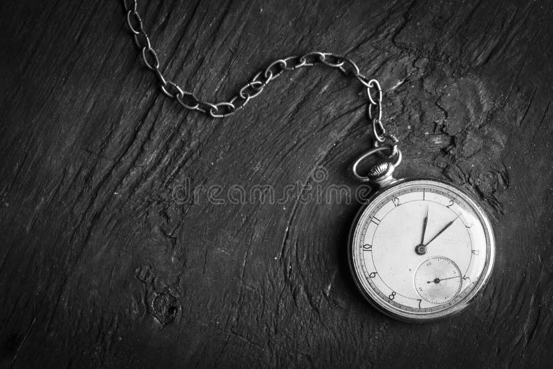 Old Clock With Chain Lying On Rough Green Surface Stock Photo - Image ...