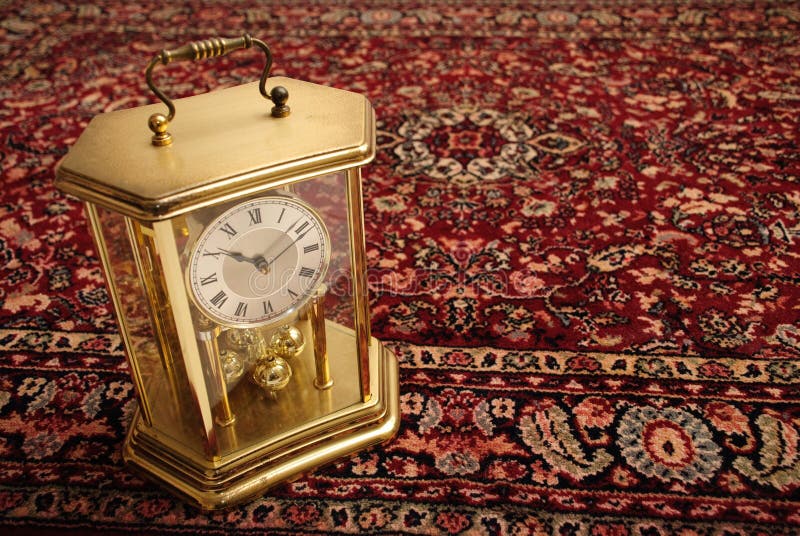 Antique Clock on Persian Rug Stock Image - Image of vintage, minute ...