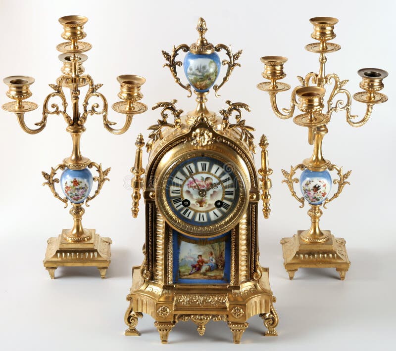 Antique Clock With Two Sconces Picture. Image: 3684810