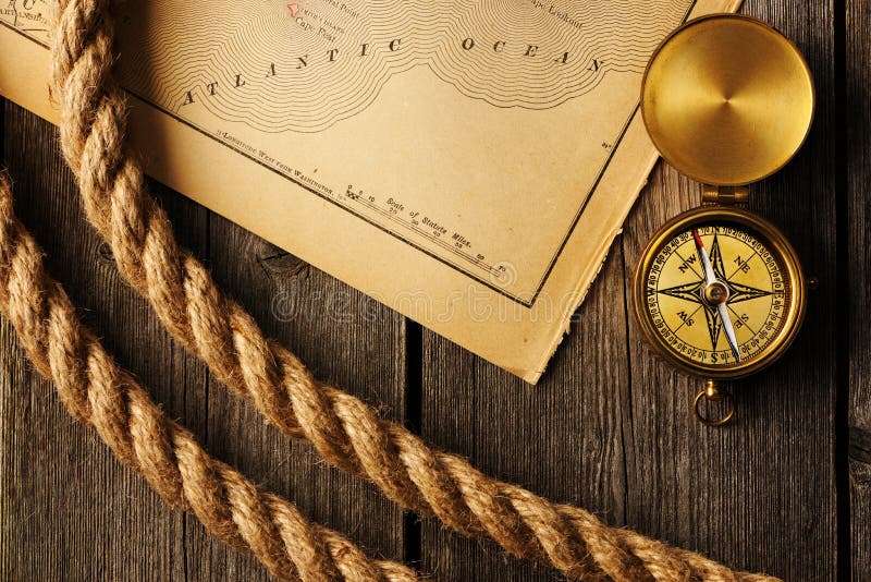 Antique Compass and Rope Over Old Map Stock Image - Image of paper ...