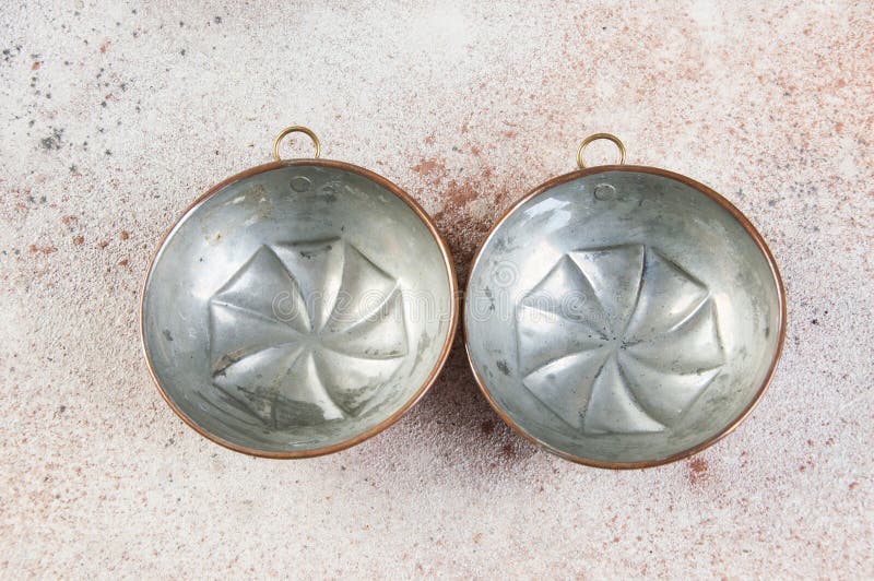 Antique Copper Molds on a Concrete Background Stock Photo - Image of ...