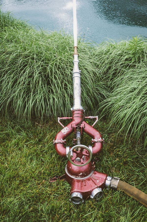 Antique Fire Engine Water Pump Stock Image - Image of water ...