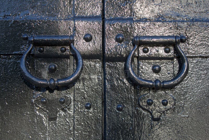 Antique Forged Handles on the Gate Stock Photo - Image of black, rusty ...