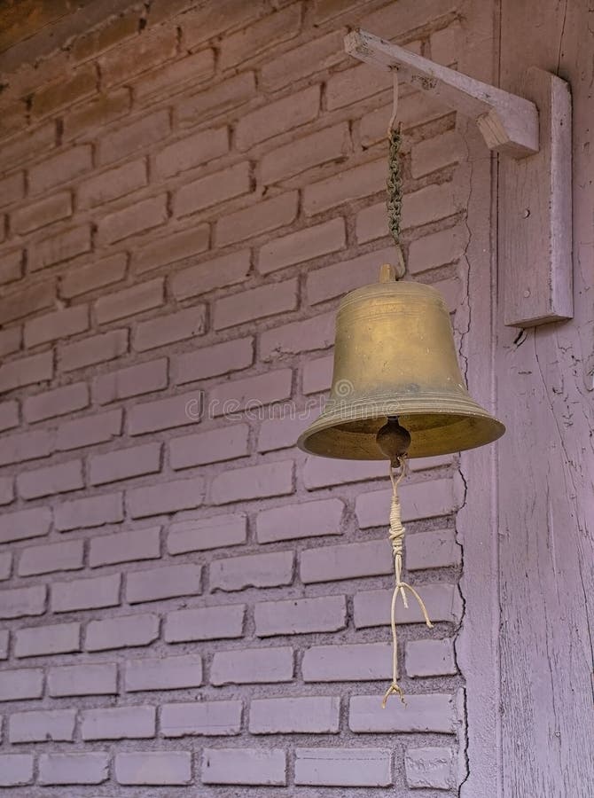 Antique hanging bell stock image. Image of gold, people - 250092837