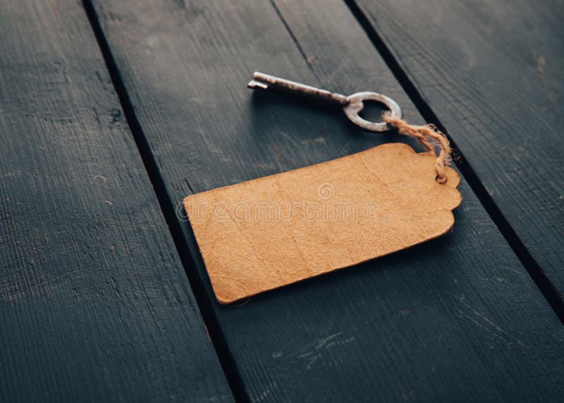 Antique key with the label stock image. Image of vintage - 271254533