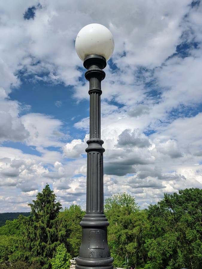Lamppost Jutting into the Cloudy Sky Stock Photo - Image of strength ...