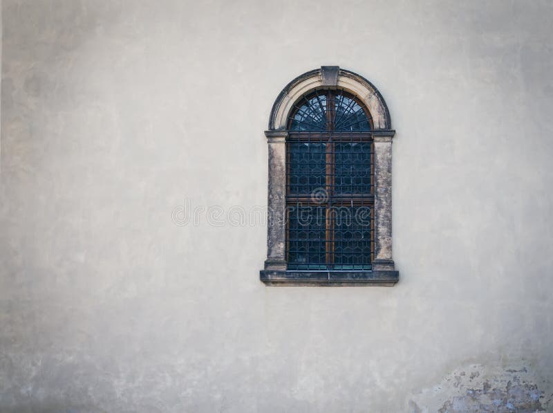 Antique Medieval Window with Iron Bars and Old White Wall Stock Photo ...