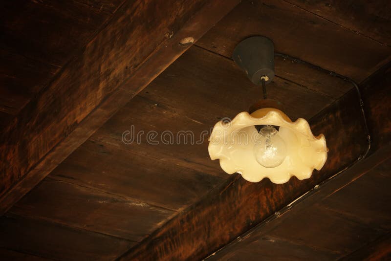 Antique Metal Light Hanging from Old Wooden Barn Ceiling Stock Image ...