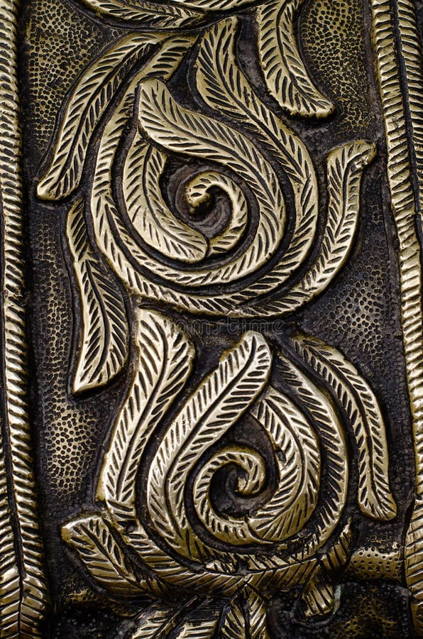 Antique metal relief stock photo. Image of texture, background - 64917970
