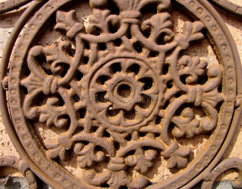 An antique metal rosette stock photo. Image of texture - 659786