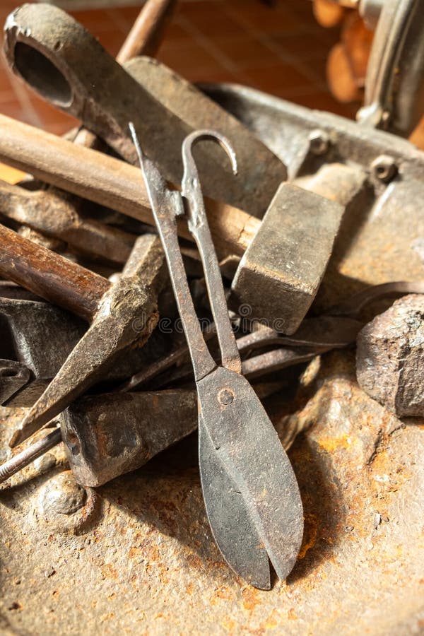 Antique Metal Tools for Traditional Blacksmithing. Old Work Tools Stock ...