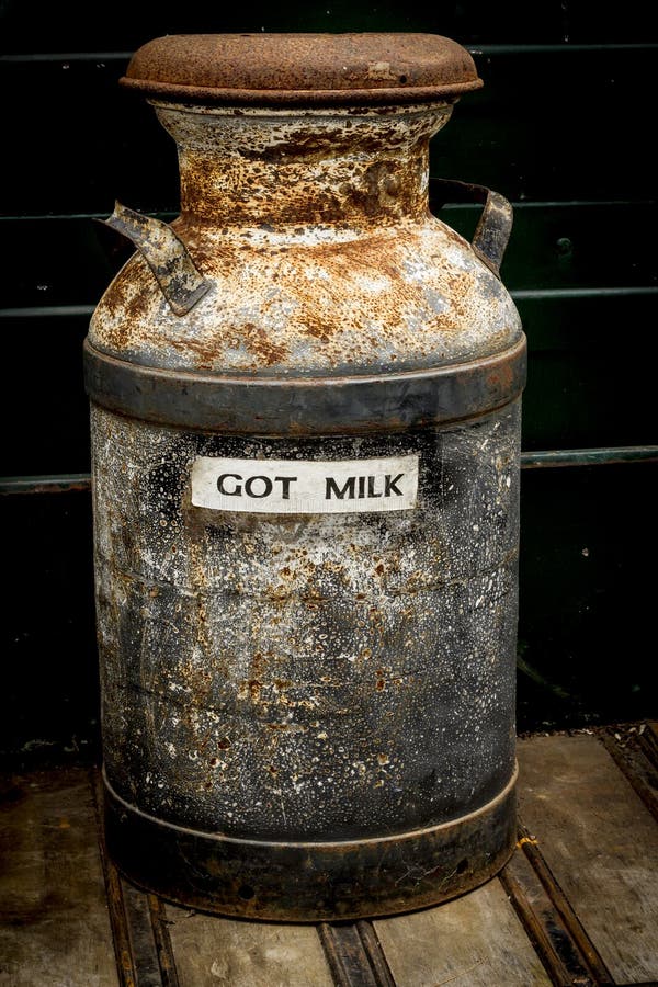 Antique Milk Can on farm stock image. Image of dented - 10890699