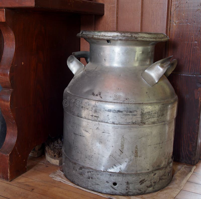 Antique Milk Can on farm stock image. Image of dented - 10890699