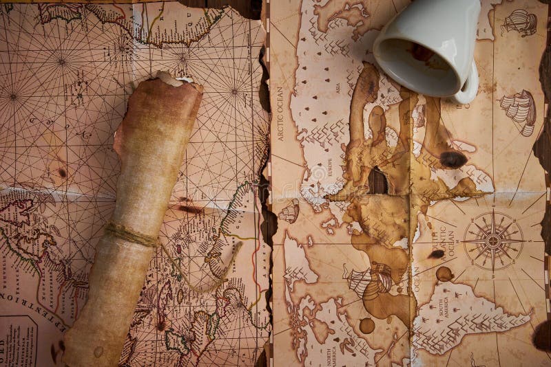 Antique Parchment Scroll with Old Maps and a Spilled Coffee Cup on a ...