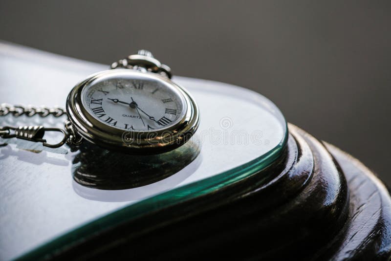 Antique Pocket Watch on Glass Table Stock Photo - Image of silver ...