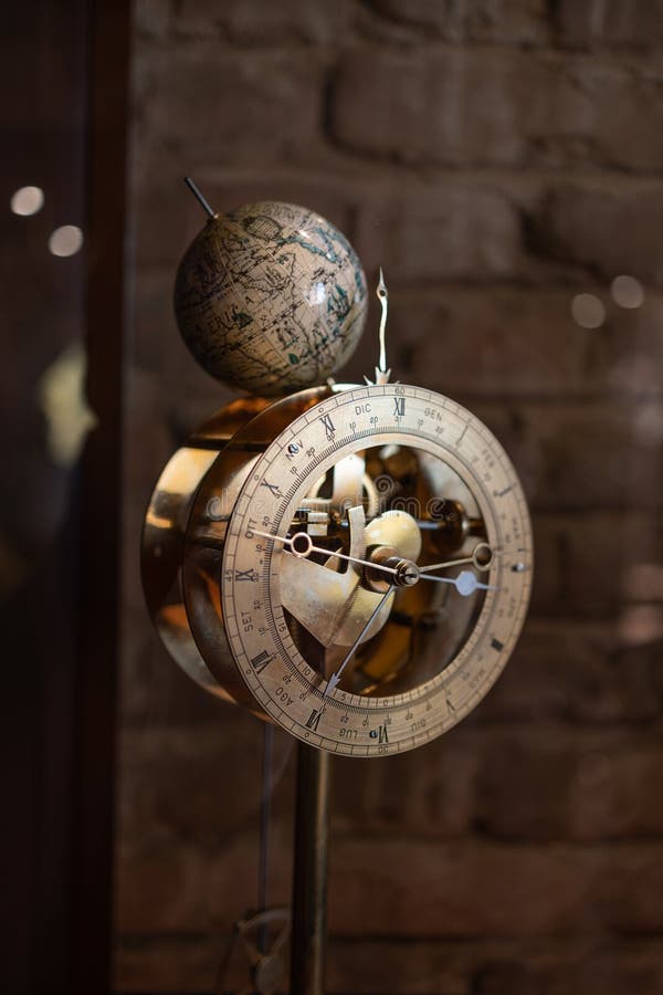 Antique and Precious Golden Clock with Rotating Earth Globe Editorial ...