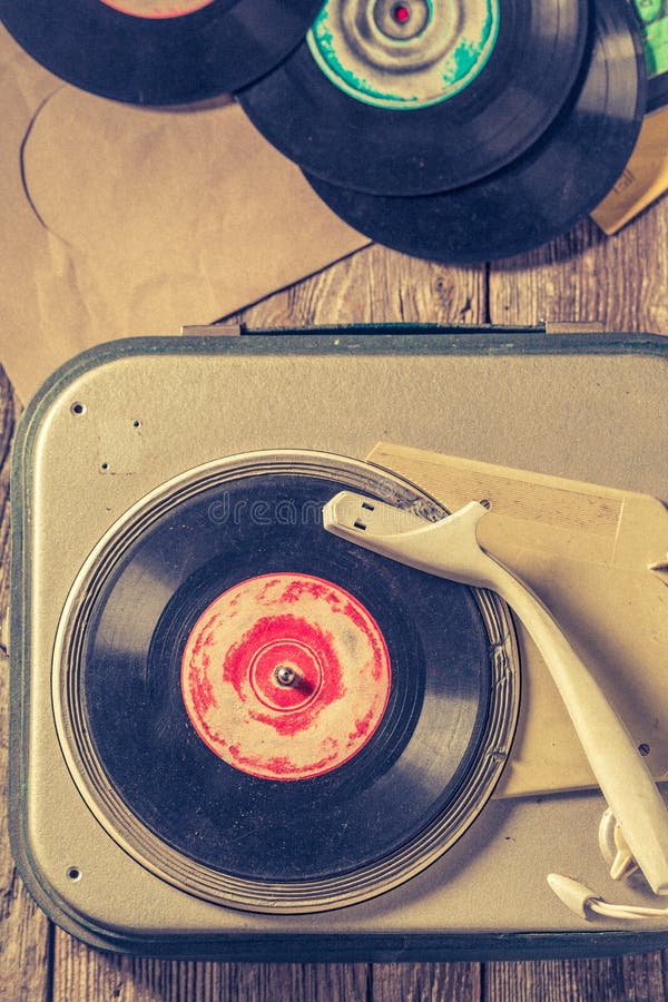 Antique Record Player with a Stack of Vinyl Records Stock Photo - Image ...