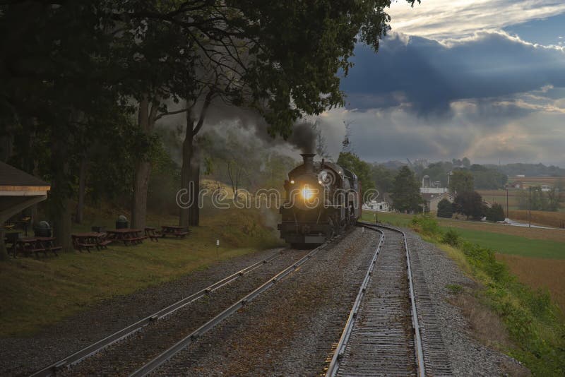 Antique Restored Steam Freight Train Approaching Blowing Smoke and ...