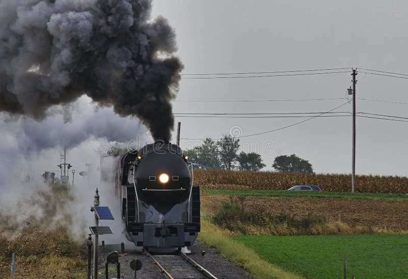 Antique Restored Steam Freight Train Approaching Blowing Smoke and ...