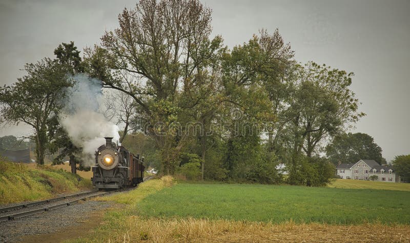 Antique Restored Steam Freight Train Approaching Head on Blowing Smoke ...