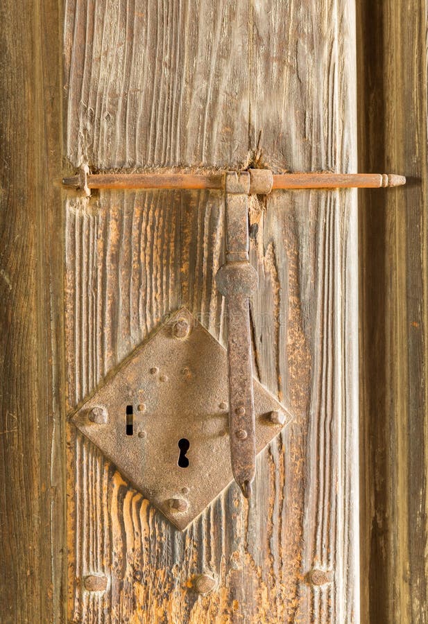 Antique Rusty Door Lock on Timber Stock Image - Image of metallic ...