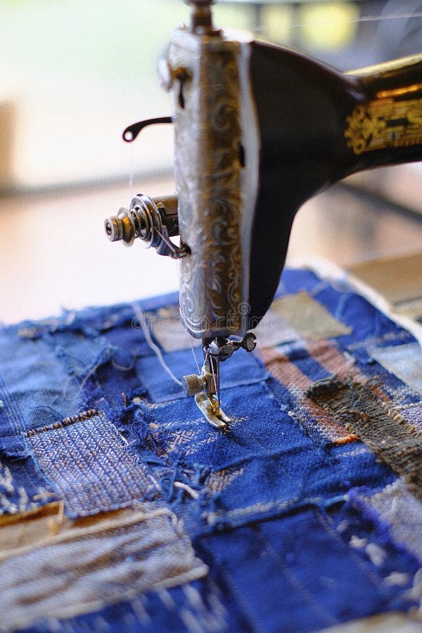 Antique Sewing Machine with Boro Patch Scrap Fabrics Stock Photo ...