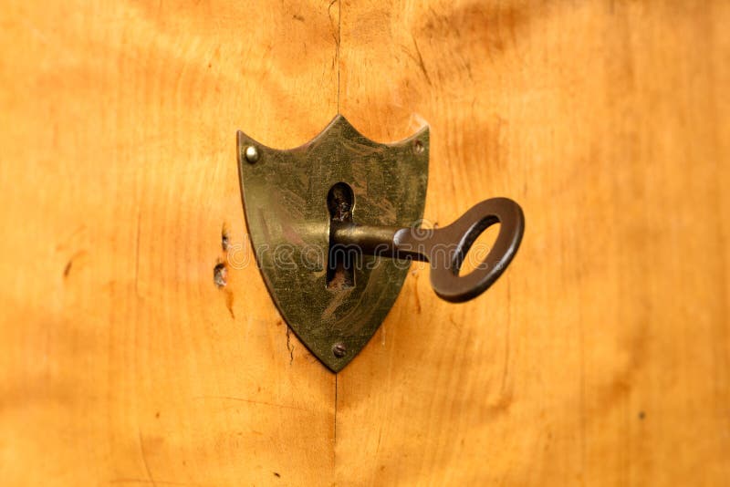 Antique Shield-shaped Lock on Bright Cherry Wood, Focus on the Lock ...