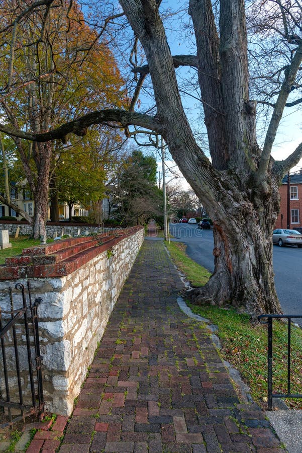 Antique Sidewalk or Walkway Paved with Stone or Cobblestones Stock ...