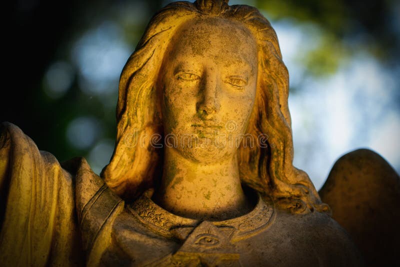 Antique Statue of Beautiful Gold Angel in the Sunlight Stock Photo ...