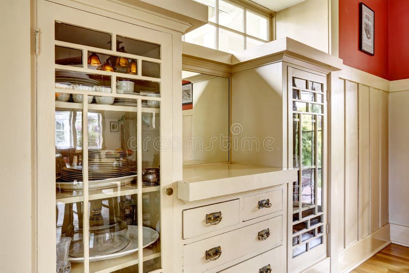 Antique Storage Combination with Glass Doors and Drawers Stock Photo ...