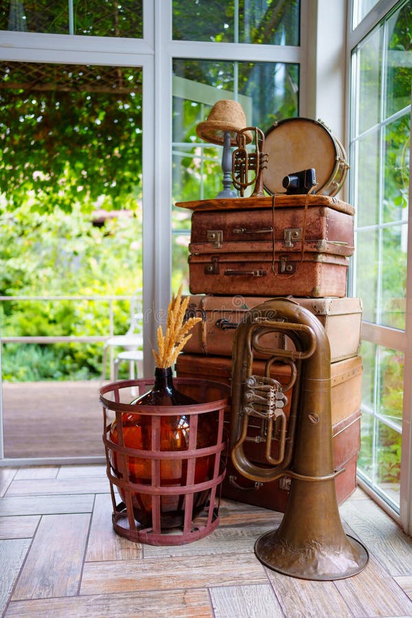 Antique Suitcases, Wind and Percussion Instruments As Interior ...