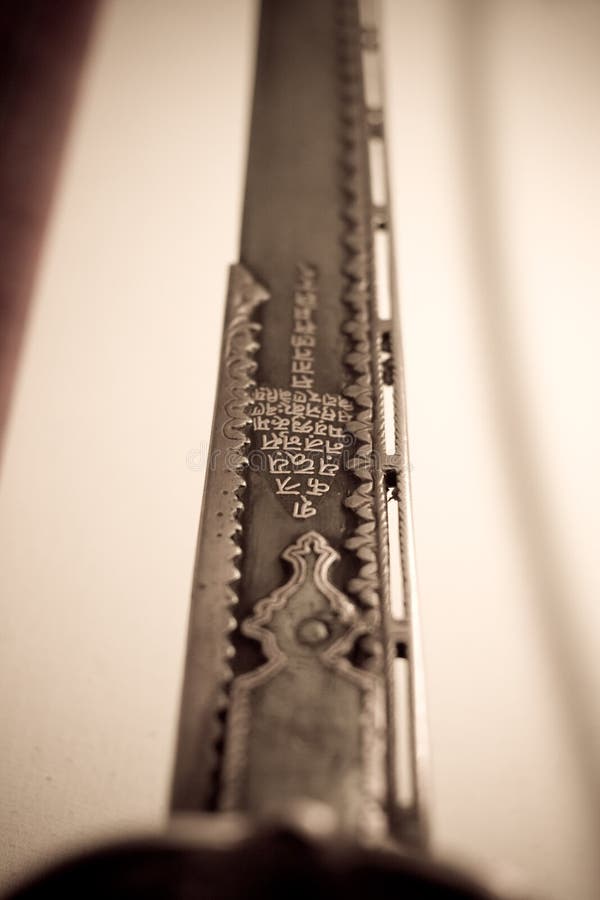 Antique Sword with Inscriptions Stock Photo - Image of depth, field ...