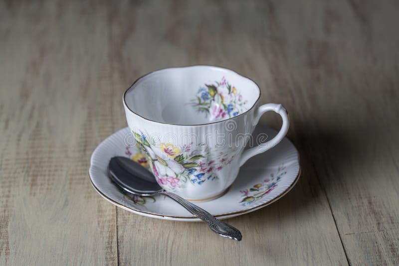 Antique Teacup with Silver Spoon Stock Photo - Image of black, teacup ...
