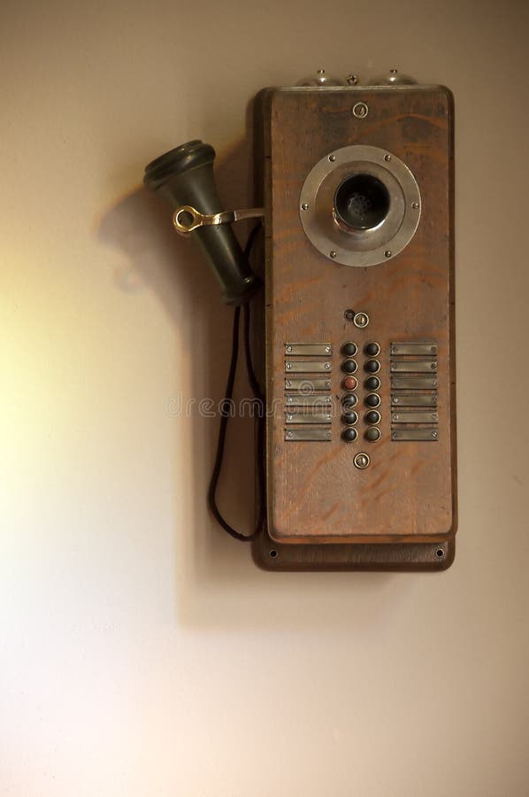Antique telephone on wall. stock image. Image of office - 36898939