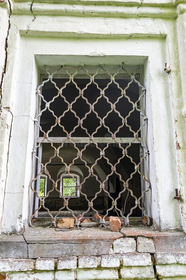Antique window with bars stock image. Image of brown - 225169919