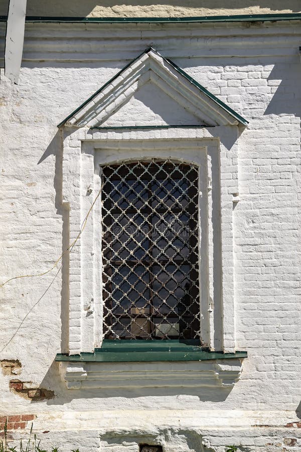 Antique window with bars stock image. Image of brick - 198263009